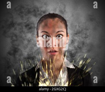 Woman with shocked expression smoke and sparks Stock Photo - Alamy