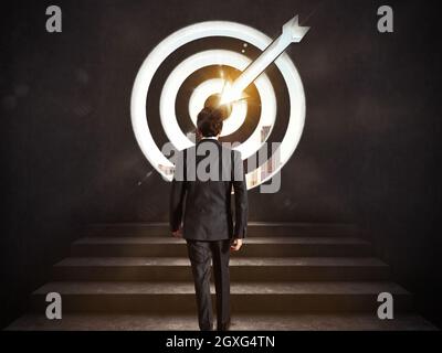 Stairs up to a target with the arrow etched in the wall. Arrive at a ...