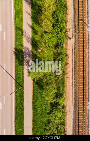 Aerial view of pathway, road and railways Stock Photo - Alamy