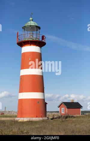 The red and white lighthouse Närs fyr at Närsholmen on the island ...