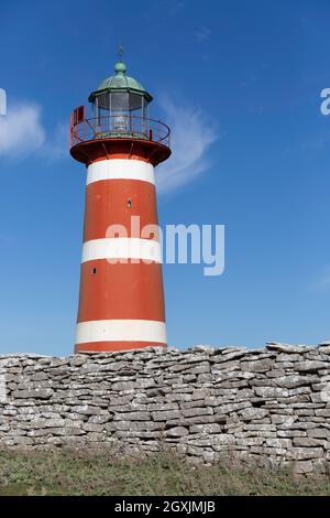 The red and white lighthouse Närs fyr at Närsholmen on the island ...