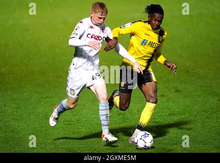 Aston Villa's Hayden Lindley (left) and Burton Albion's Daniel Jebbison ...