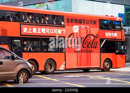 A bus displays a commercial advertisement of the American soft drink ...