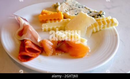 Deli Cheese Plate with Cold Cuts and Fish Charcuterie Stock Photo - Alamy