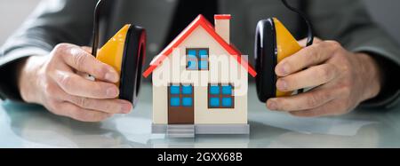 House Loud Noise Protection. Construction Sound Protection Stock Photo ...