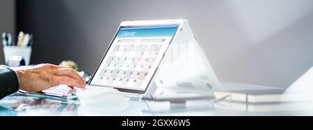 Digital Calendar Weekly Agenda On Hybrid Tablet Stock Photo - Alamy