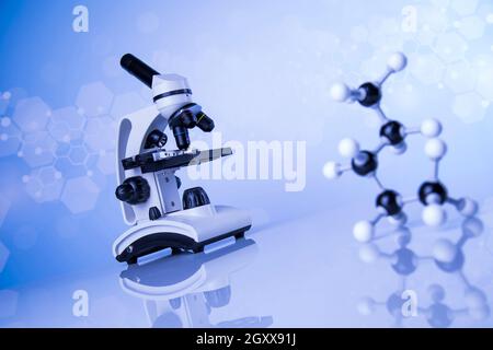Atom, Microscope, Laboratory beakers,Science experiment Stock Photo - Alamy