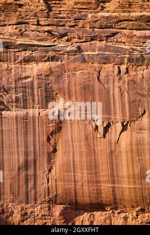 A vertical shot of the sandstone formations in the cave with dreamy sun ...