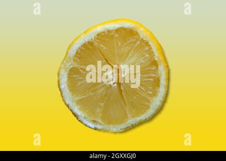 yellow lemon slice over matching colour gradient background Stock Photo ...
