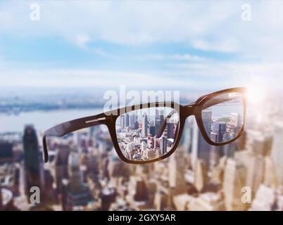 Glasses that correct eyesight from blurred to sharp Stock Photo - Alamy