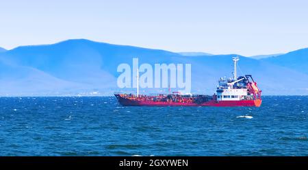 The selective focus bulk cargo ship to harbor quayside Vladivostok ...