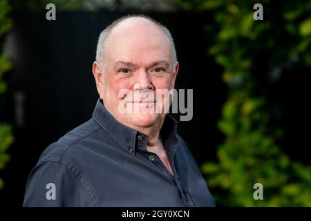 Sir Bernard Gray poses for a portrait at home in Bowden, UK Stock Photo ...