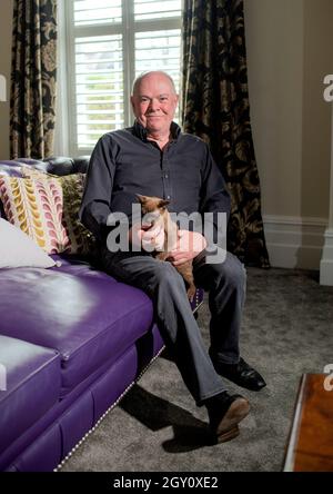 Sir Bernard Gray poses for a portrait at home in Bowden, UK Stock Photo ...