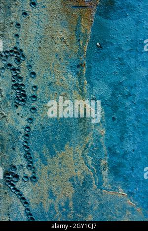 The old wall, painted in color graffiti drawing red aerosol paints ...