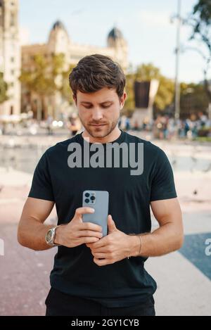 Photo of cool millennial brunet guy show thumb up wear yellow shirt ...