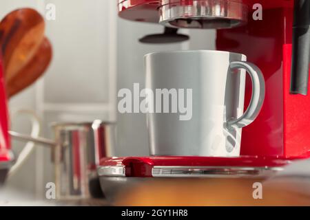 Red retro style coffee machine close up Stock Photo - Alamy