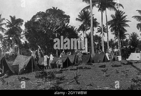 African Askari patrol building a tent camp, German East Africa 1900s ...