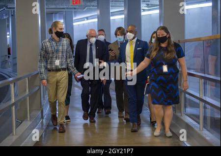 Sen. Bernie Sanders, I-Vt., heads to the chamber as the Senate votes to ...