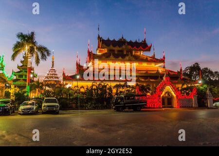 MANDALAY, MYANMAR - DECEMBER 4, 2016: Night view of Kyauktawgyi temple ...