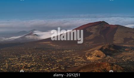 Fields with black sand and hills in the area of the Tolbachik volcano ...