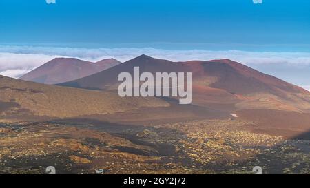 Fields with black sand and hills in the area of the Tolbachik volcano ...