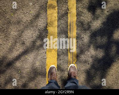 Two man legs in the top of a mountain by the sunset Stock Photo - Alamy