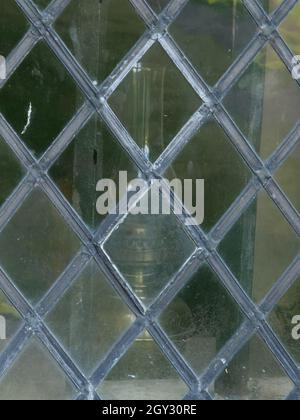 Old latticed window as background in the old town of the medieval city ...
