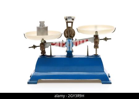 Retro roberval balance with weight, scale isolated on a white ...