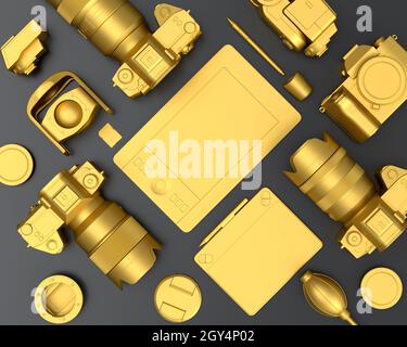 Top view of gold designer workspace and gear like nonexistent DSLR ...