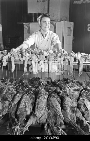 1930s WOMAN IN KITCHEN GROCERIES ON TABLE TALKING ON TELEPHONE Stock ...
