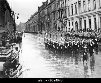 View from a Mercedes on the parade of the SA standard bearers through ...