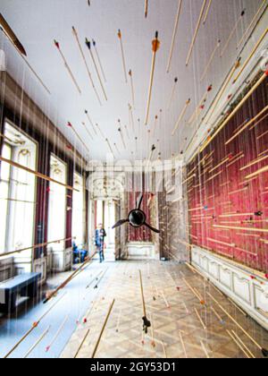 Group of floating arrows on a lobby of a building Stock Photo - Alamy