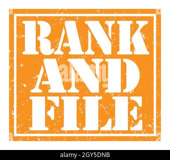 RANK AND FILE, words written on red rectangle stamp sign Stock Photo ...