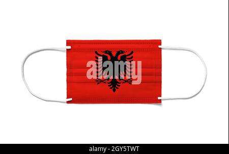 Flag of Albania on a disposable surgical mask. White background ...