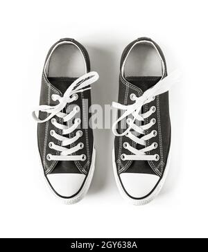 Black generic sneakers isolated on white background Stock Photo - Alamy