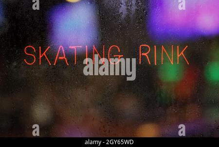 Vintage Neon Skating Rink Sign in Rainy Window Stock Photo - Alamy