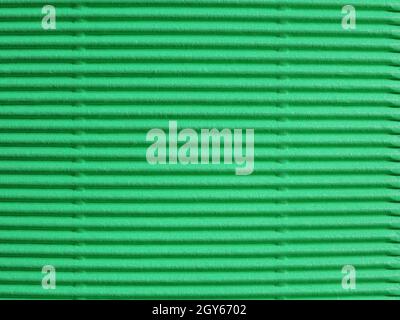 green cardboard texture useful as a background Stock Photo - Alamy