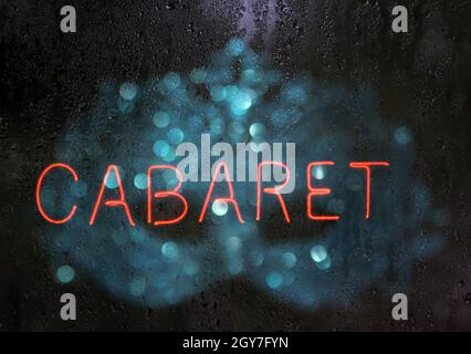 Vintage Neon Cabaret Sign With Bokeh Carnival Mask Stock Photo - Alamy