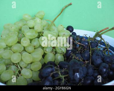 white and red grape (scientific name Vitis vinifera) vegetarian fruit ...