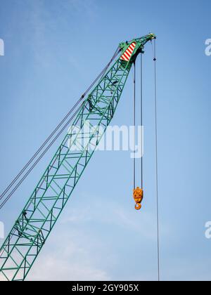 Green crane with 70 tons lifting weight Stock Photo - Alamy
