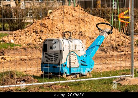 Vibratory plate compactor in construction rammer ground compaction of ...