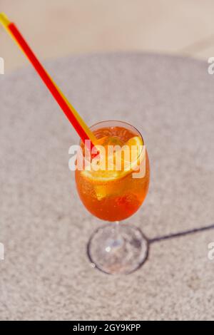Cold glass of Rum swizzle stand on table. View from above Stock Photo ...