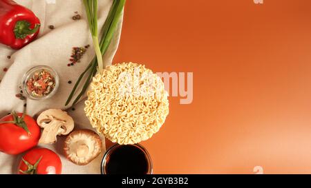 Instant noodles with king mushrooms, seasonings, soy sauce, peppers ...