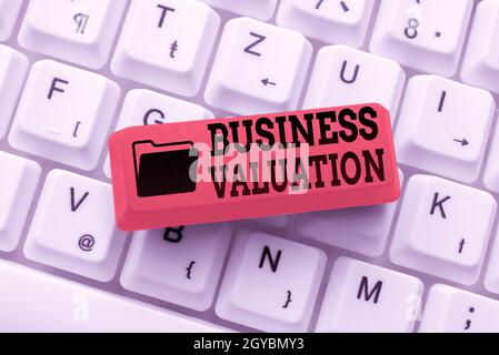 Hand writing sign Business Valuation, Word Written on determining the ...