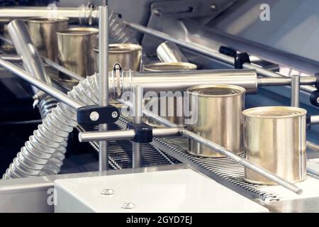 Industrial machine used in canning jar production. A close-up view ...