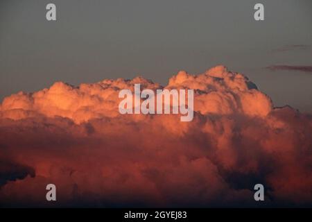 dense cloud puddle,heavy clouds,red clouds and sky at sunset Stock ...