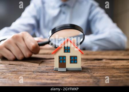 Real Estate House Inspection Before Purchase. Inspector Using Magnifier ...