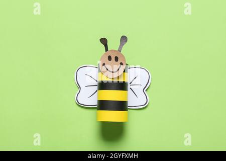 Bee made of cardboard tube for toilet paper on white background Stock ...
