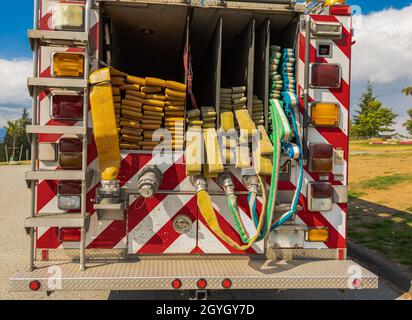 Rear view of fire engine - red and yellow warning chevron pattern Stock ...