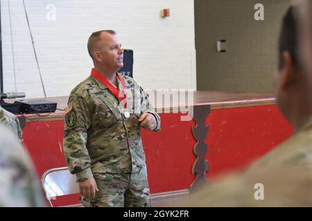 U.S. Army Col. Jason E. Briggs, right, commander of the 224th ...